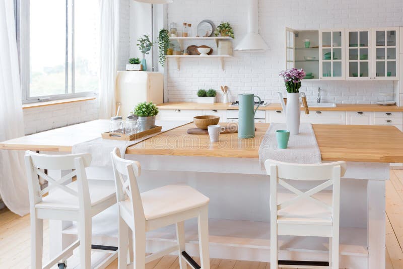 Stylish Kitchen in Light Colors in a Trendy Modern Duplex Apartment ...