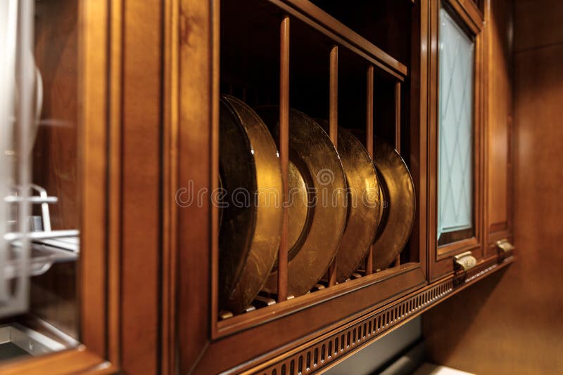 Stylish Kitchen with Metal Plates in Cupboard Stock Image - Image of ...