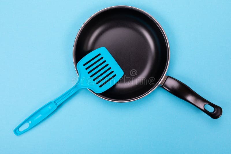 Kitchen Utensils Isolated on Blue Background Stock Photo - Image of ...