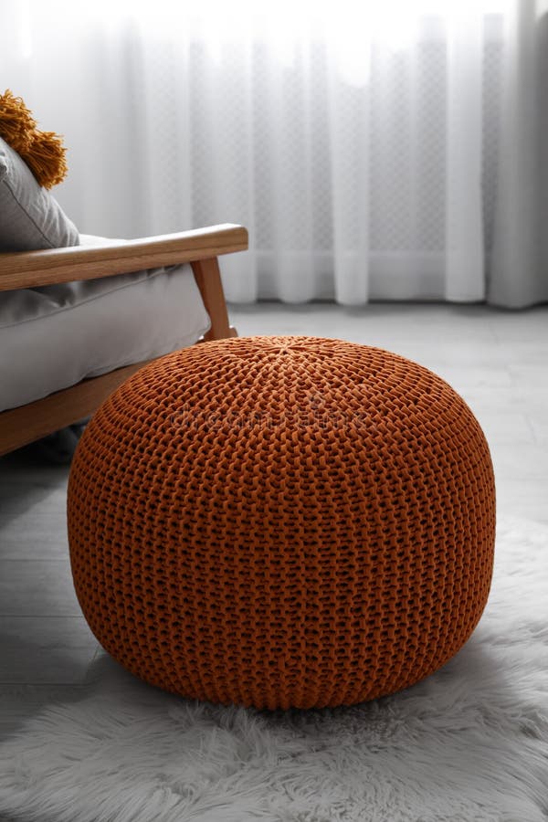 Stylish Knitted Pouf on Floor in Room. Interior Design Stock Photo ...