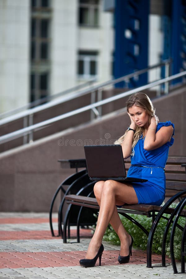 Stylish Lady with Laptop Sitting on a Bench Stock Photo - Image of ...