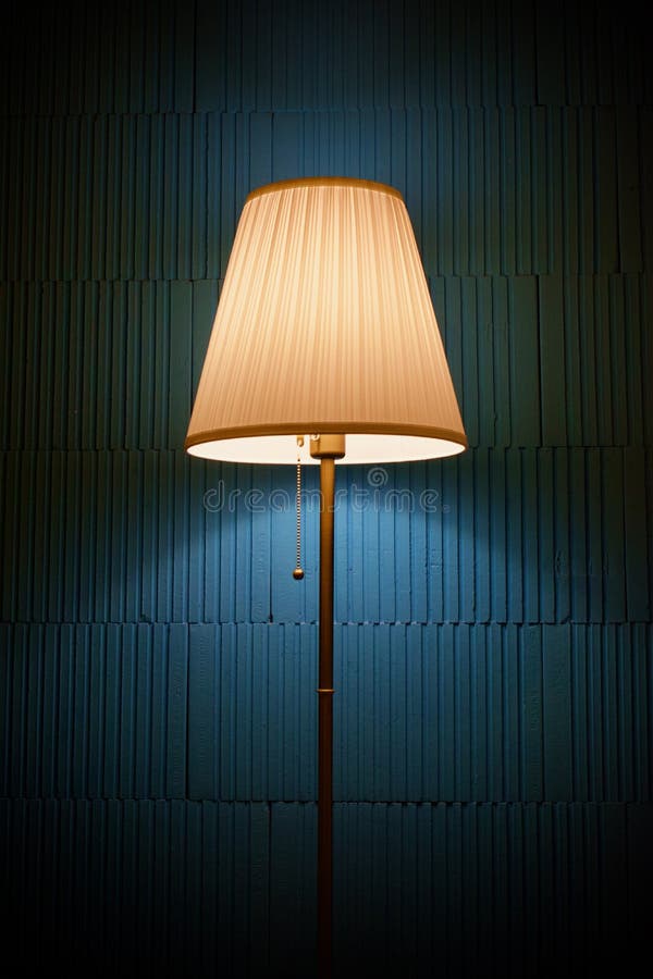 Stylish Lamp Standing in Front of a Brick Wall Stock Photo - Image of ...