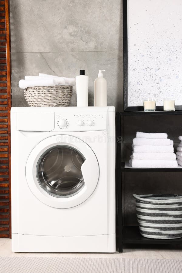 Stylish Laundry Room with Modern Washing Machine. Interior Design Stock ...