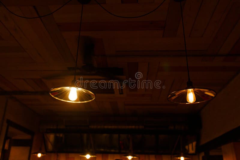 Stylish Lighting Lamps Over a Bar Counter in a Loft Hookah Bar Stock ...