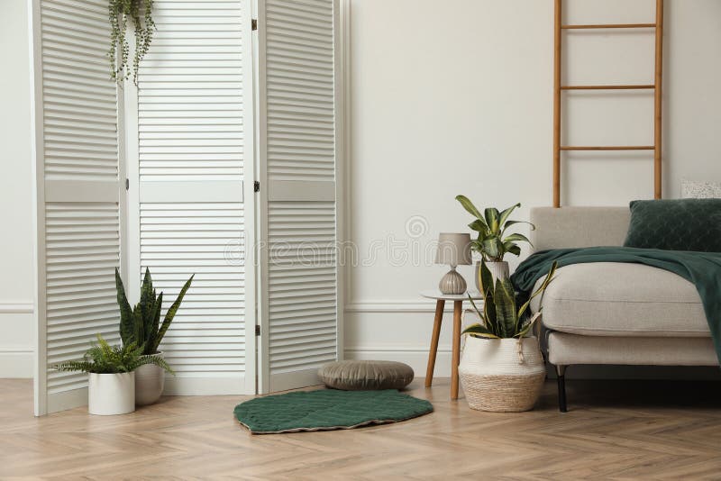 Stylish Living Room with Folding Screen and Sofa. Interior Design Stock ...