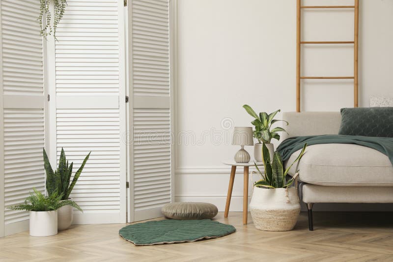 Stylish Living Room with Folding Screen and Sofa. Interior Design Stock ...