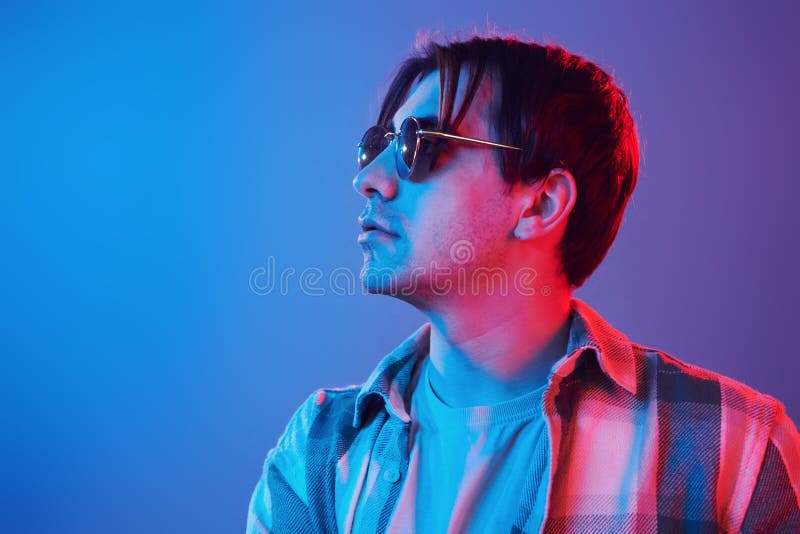 Stylish Look. Man Standing in the Studio with Neon Light Stock Photo ...