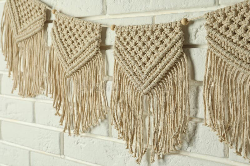 Stylish Macrame Hanging on White Brick Wall, Closeup Stock Image ...