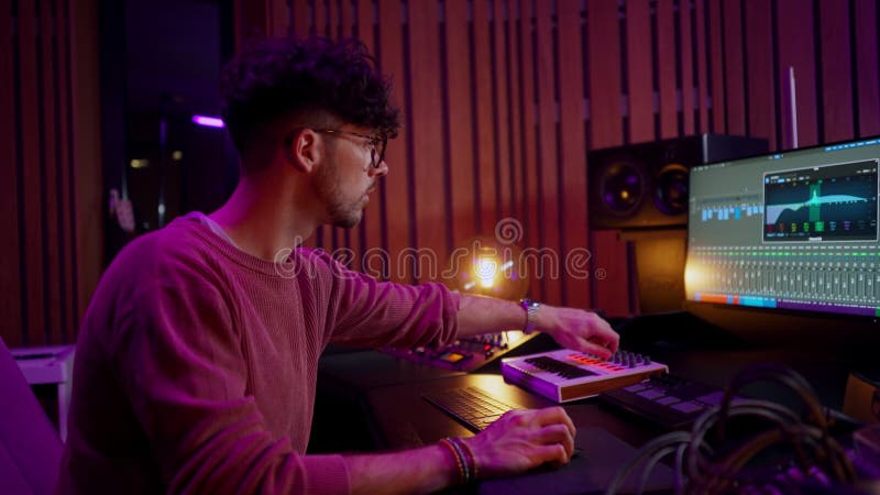 Stylish Male Audio Engineer and Producer Working in Music Recording ...