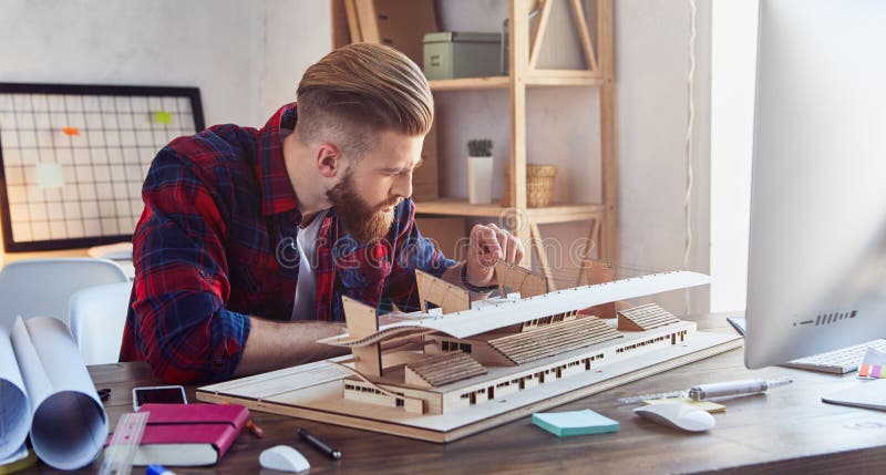 Stylish Male Designer Looking at Model House Stock Photo - Image of ...