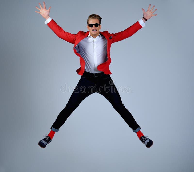 Stylish Man Having Fun Jumping Stock Photo - Image of adult, casual ...