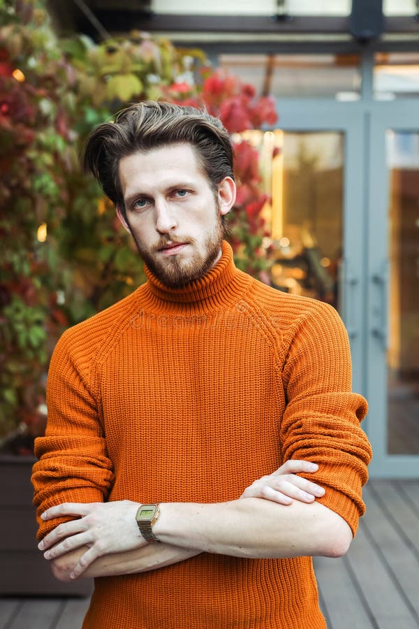 Stylish Man in an Orange Turtleneck, Portrait in an Urban Setting Stock ...