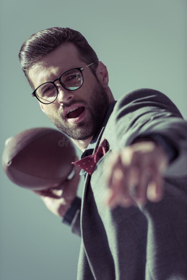 Stylish Man with Rugby Ball Stock Image - Image of sportive, throwing ...