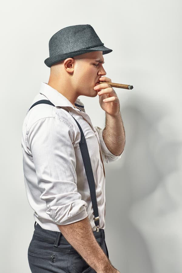 Stylish man smoking cigar stock image. Image of macho - 60050719