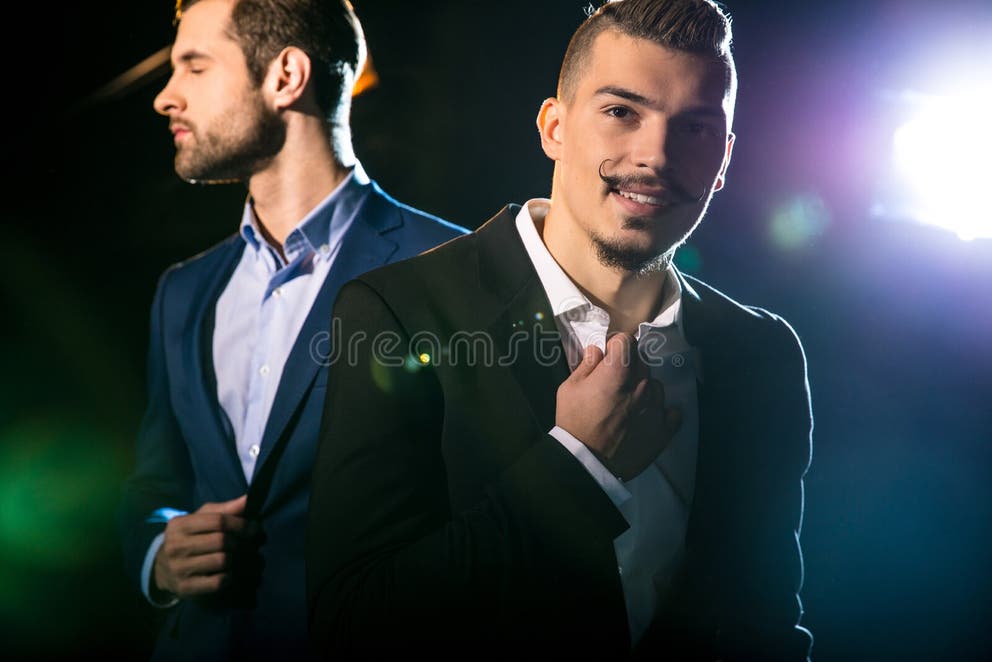 Stylish men in suits stock photo. Image of celebrate - 84058332