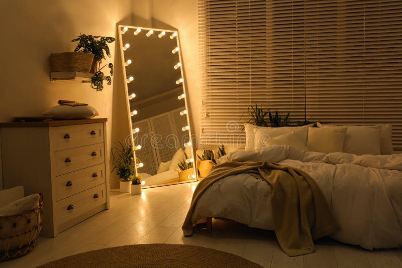 Stylish Mirror with Light Bulbs in Bedroom. Interior Design Stock Photo ...