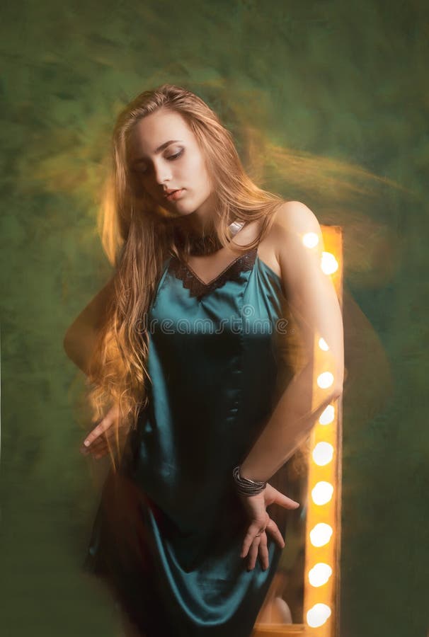 Stylish Model Dancing in Studio with Mixed Light Stock Photo - Image of ...