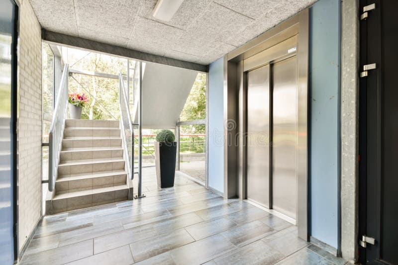 Modern Interior Entrance with Elevator and Stairs Stock Photo - Image ...