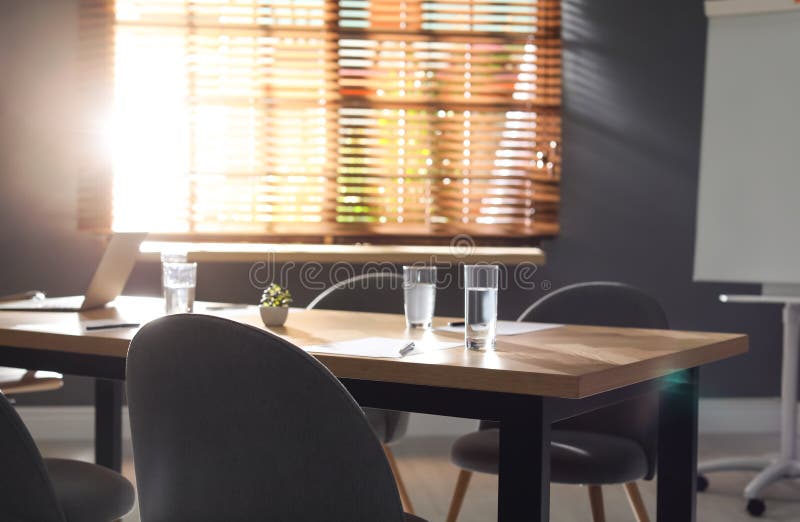 Stylish Office Interior with Table in Morning Stock Photo - Image of ...