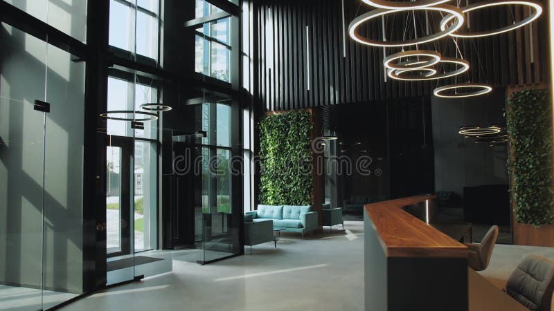 A Modern Office Lobby with Greenery and Contemporary Design ...