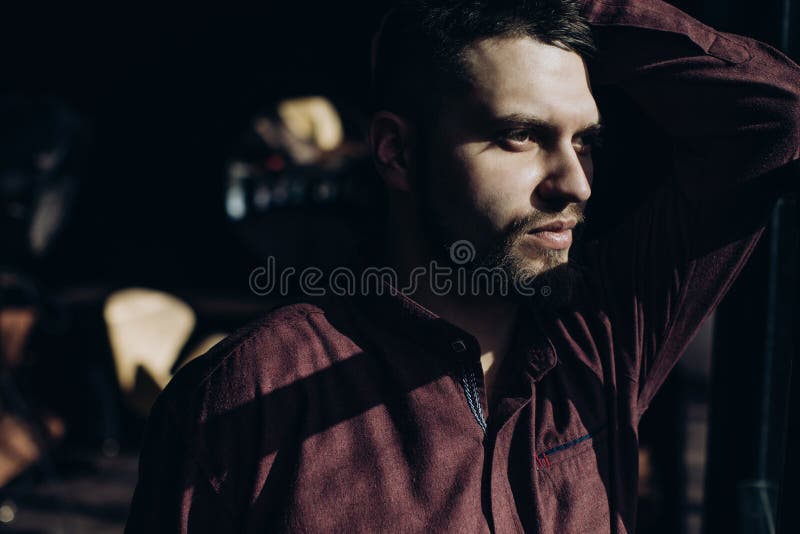 Stylish Portrait of a Concentrated Young Bearded Man Stock Image ...