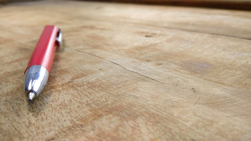 Stylish Red Pen on Wood Background Stock Photo - Image of black ...