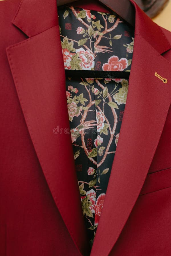 Stylish Red Suit Jacket with a Complementary Black Tie and Matching ...