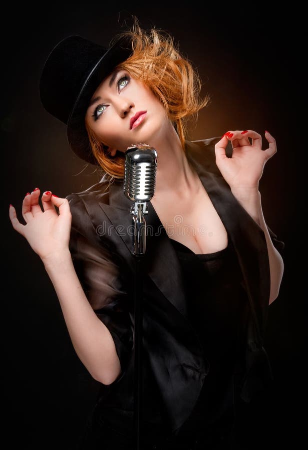 Stylish redhead singer stock photo. Image of hairs, attractive - 19412006