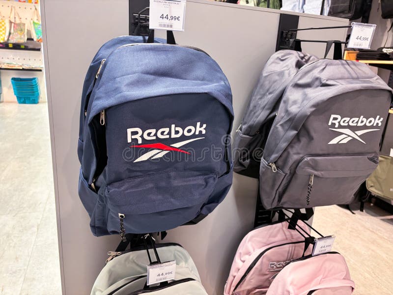 Stylish Reebok Backpacks Displayed on a Rack Showcasing Modern Design ...