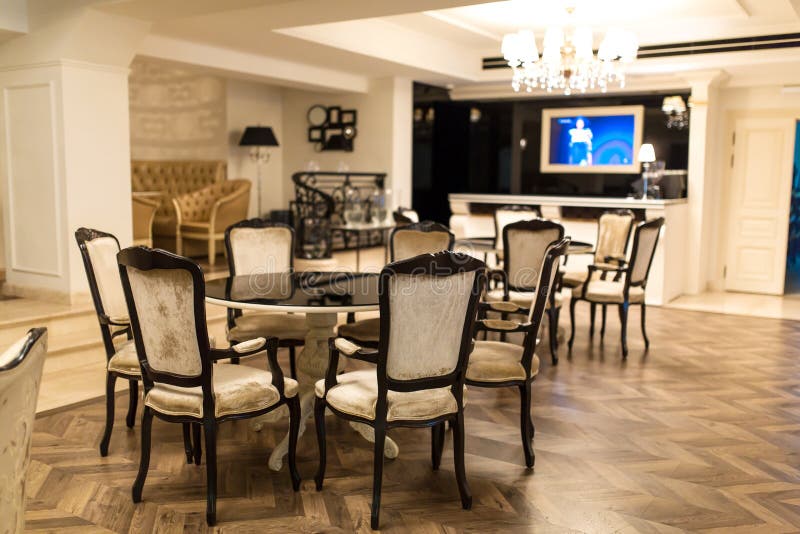 Stylish Restaurant. Small Round Table for 5 People, Near the Bar Stock ...