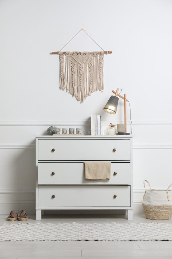 Stylish Room Interior with Chest of Drawers Near White Wall Stock Photo ...