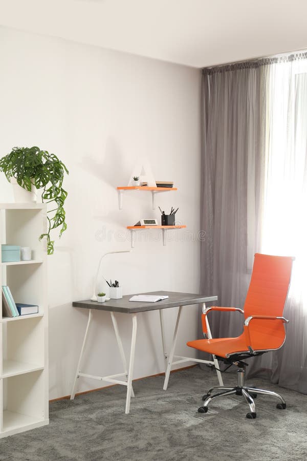 Stylish Room Interior with Workplace Near Window Stock Photo - Image of ...