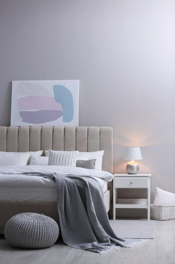 Stylish Room Interior with Large Comfortable Bed Stock Image - Image of ...