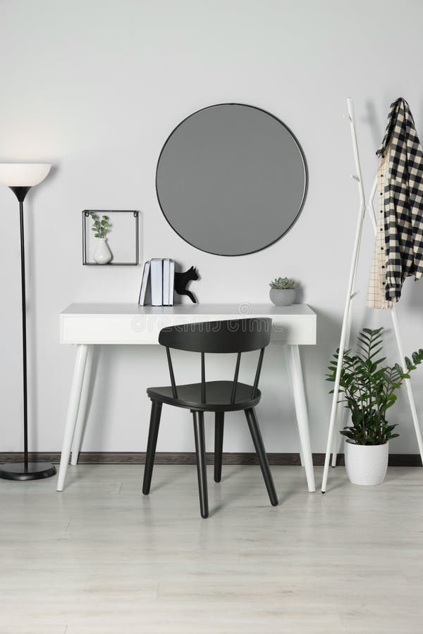 Stylish Room Interior with Round Mirror on White Wall Over Desk Stock ...