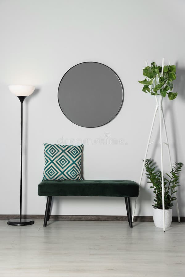 Stylish Round Mirror on White Wall Over Bench in Room Stock Photo ...