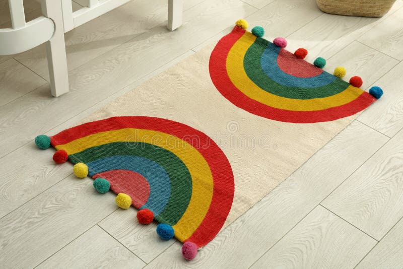 Stylish Rug with Rainbow on Floor Indoors Stock Image - Image of ...