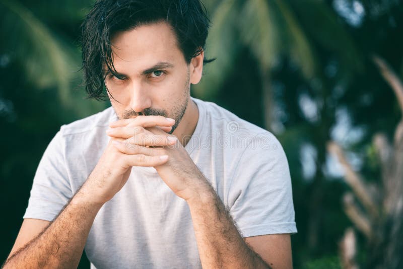 Stylish Young Brunette Man with a Beard, Closeup Portrait Outdoor ... Stylish Young Brunette Man with a Beard, Closeup Portrait Outdoor ...