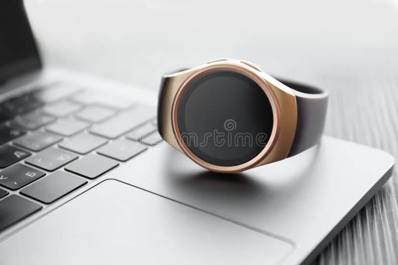Stylish Smart Watch on Laptop, Closeup View Stock Image - Image of ...