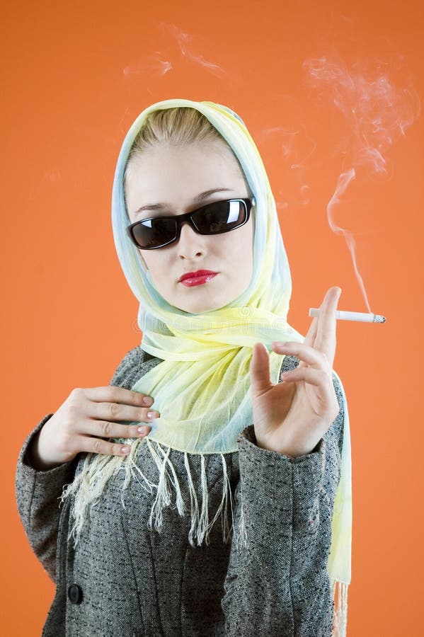 Stylish smoker stock image. Image of scarf, clothing, model - 1343717