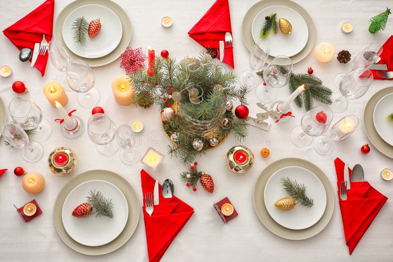 Stylish Table Setting with Burning Candles and Christmas Decorations ...
