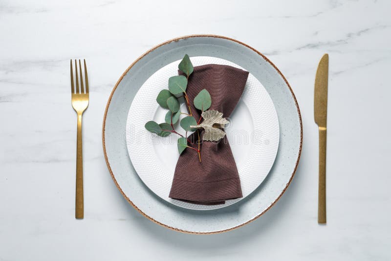 Stylish Table Setting with Cutlery and Eucalyptus Leaves, Flat Lay ...