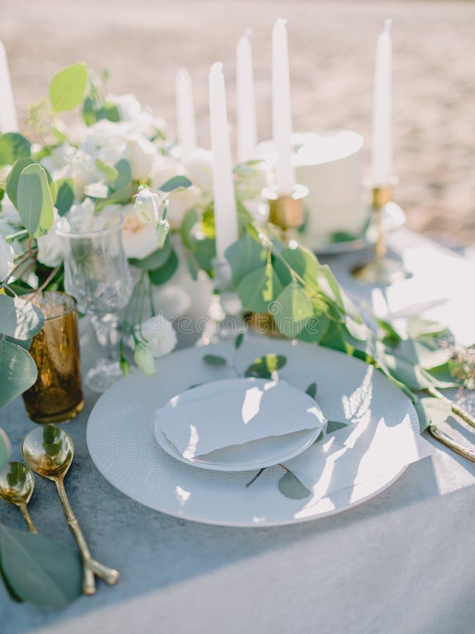 Stylish Table Setting with a Paper Card Decorated with Eucalyptus ...