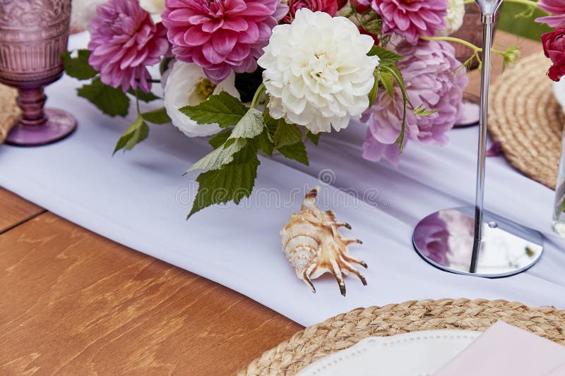 Stylish Table Setting with Shell, Pink Girly Flowers Arrangement Stock ...