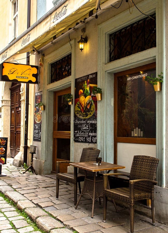 Stylish Table and Two Chairs in Front of a Restaurant Editorial Photo ...
