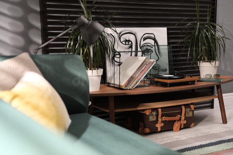 Stylish Turntable with Vinyl Discs on Table in Room Stock Image - Image ...