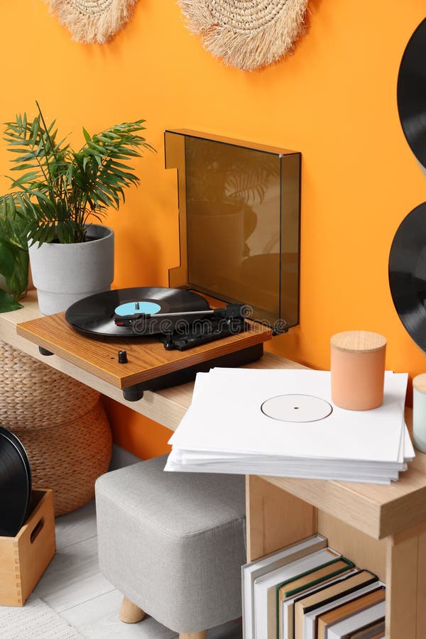 Stylish Turntable with Vinyl Record on Console Table in Cozy Room Stock ...