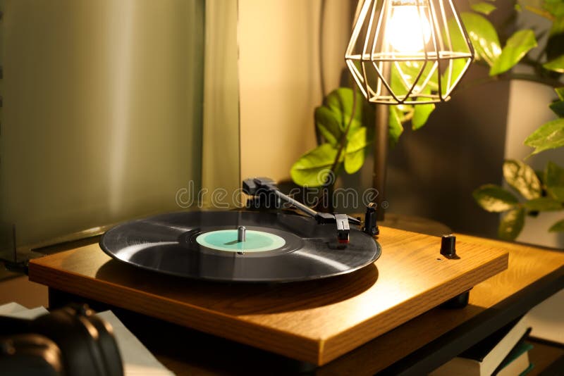Stylish Turntable with Vinyl Record on Table Indoors Stock Image ...