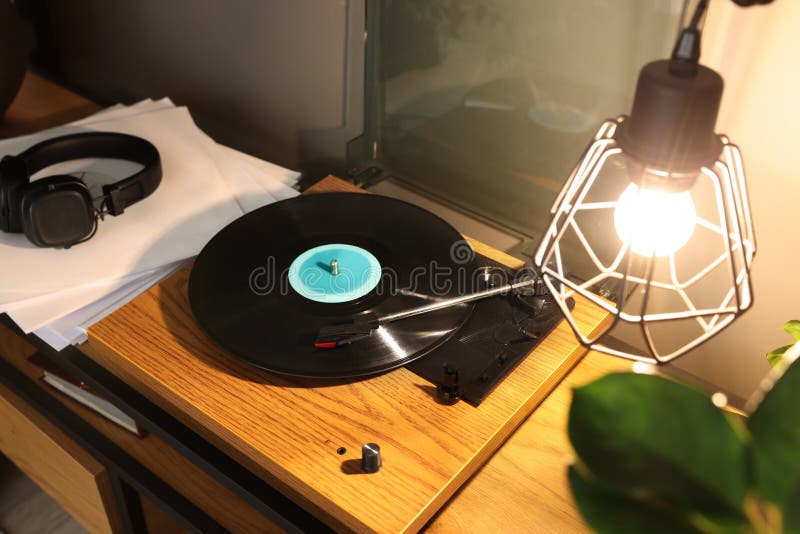 Stylish Turntable with Vinyl Record on Table Indoors Stock Photo ...