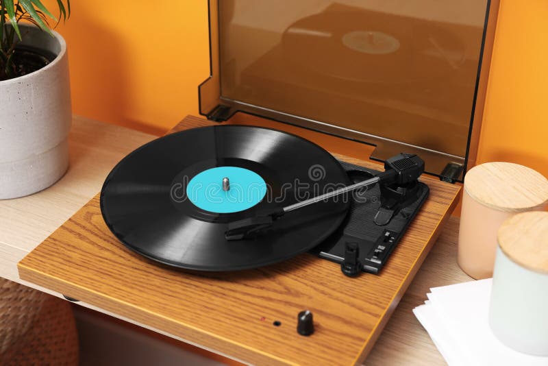 Stylish Turntable with Vinyl Record on Table Indoors Stock Photo ...