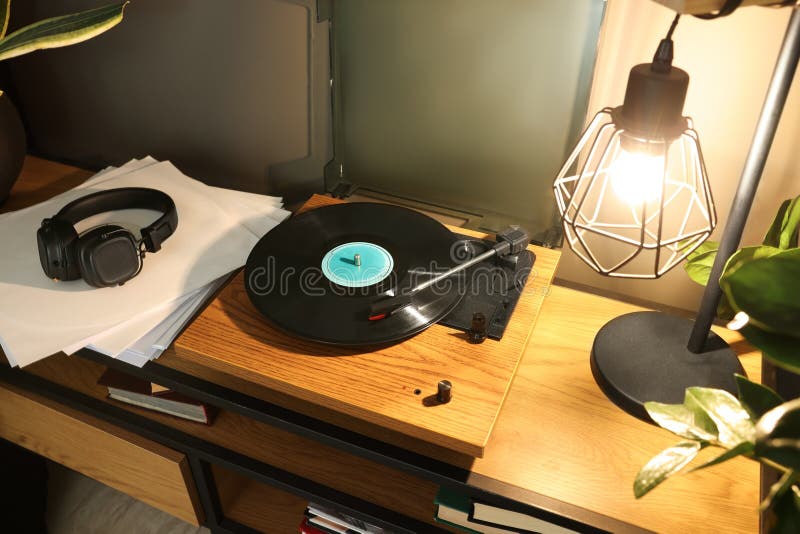 Stylish Turntable with Vinyl Record on Table Indoors Stock Photo ...